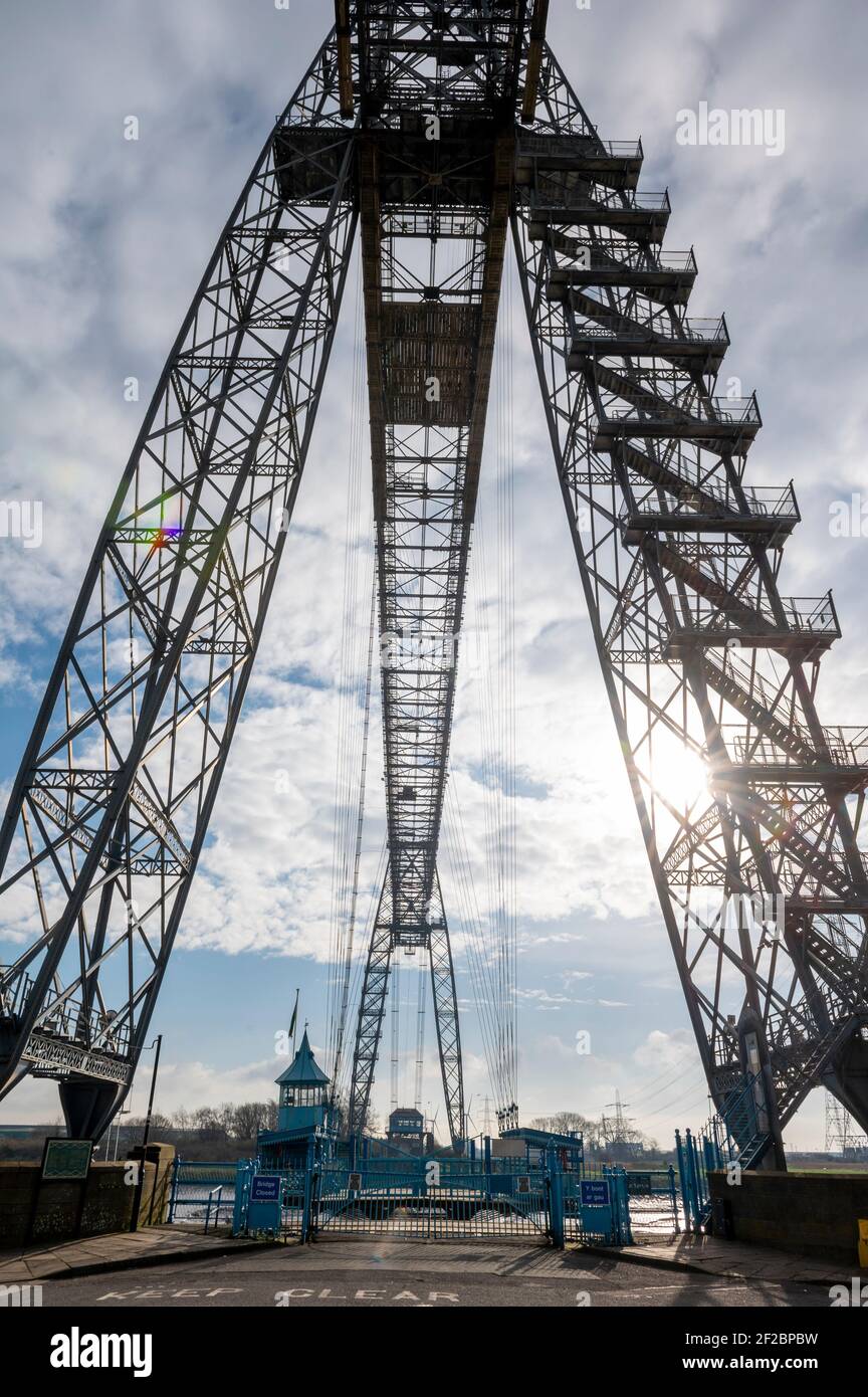 Newport Transporter Bridge against a sunny winter sky. The gondola ...