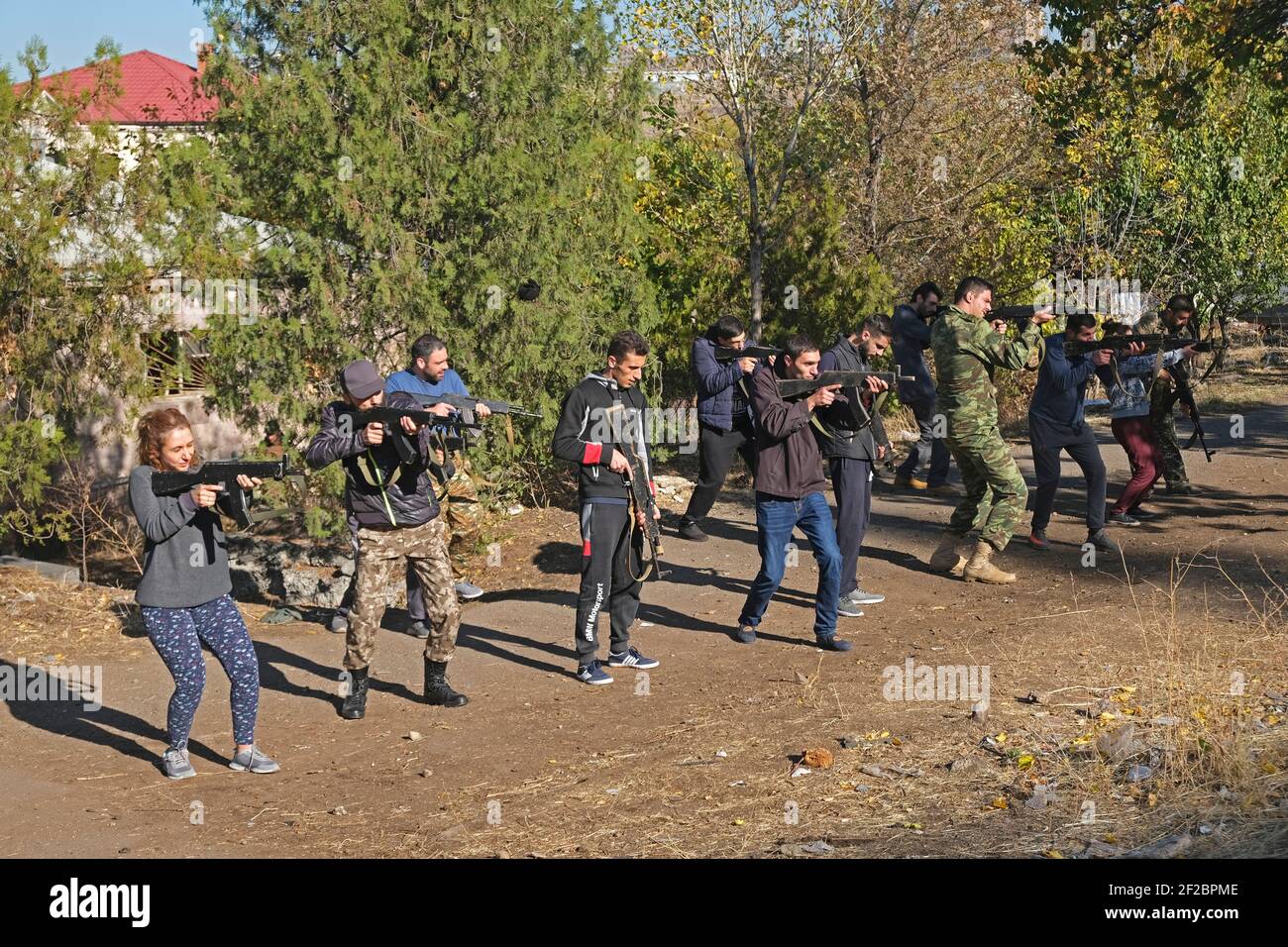 YEREVAN, ARMENIA - NOVEMBER 09: Armenian civilians use wooden cut-out ...