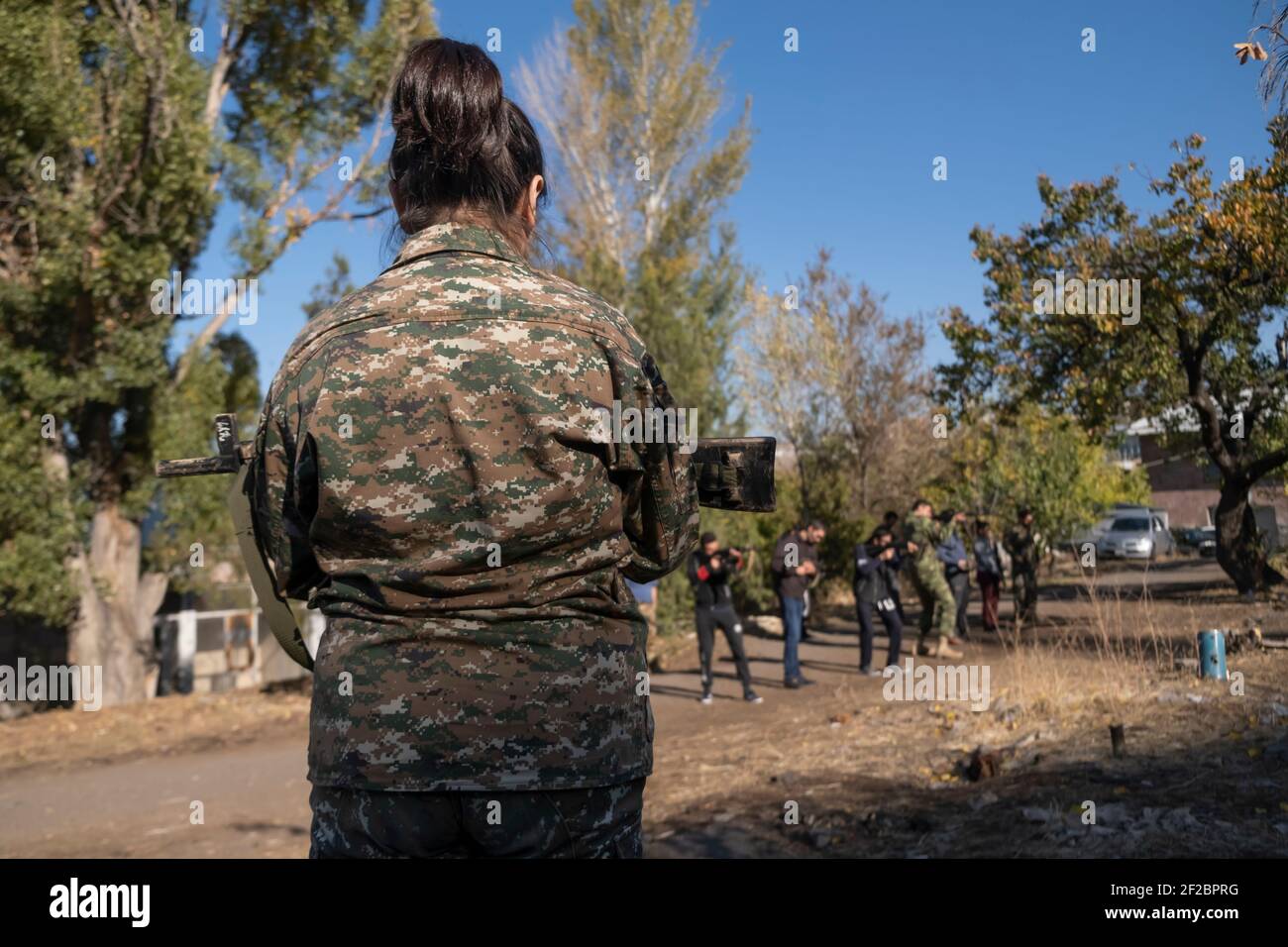 YEREVAN, ARMENIA - NOVEMBER 09: Armenian civilians use wooden cut-out ...