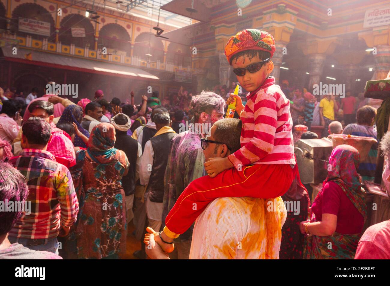 India, Mathura - Devotees celebrate Holi inside Dwarkadheesh temple ...