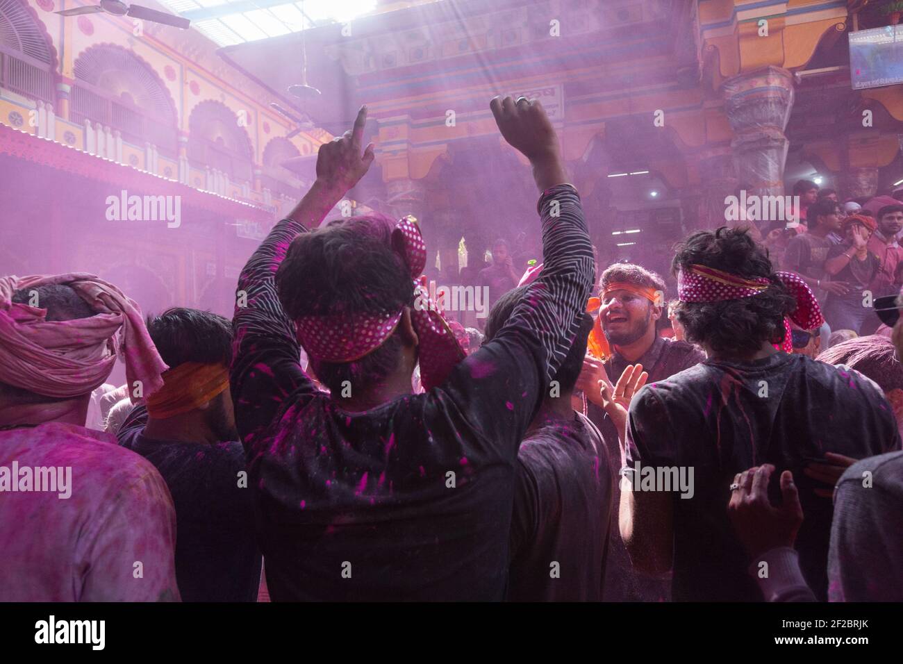 India, Mathura - Devotees celebrate Holi inside Dwarkadheesh temple ...
