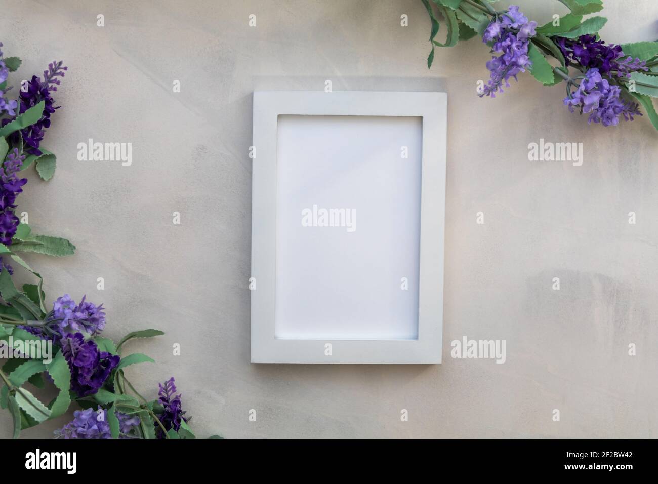 White frame mockup and lilac on gray wash background flat lay copy ...