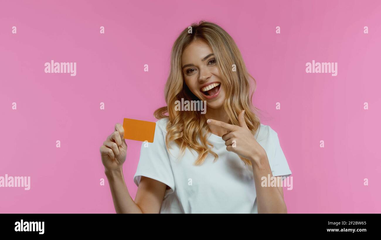 Face happy blonde woman finger hi-res stock photography and images - Alamy