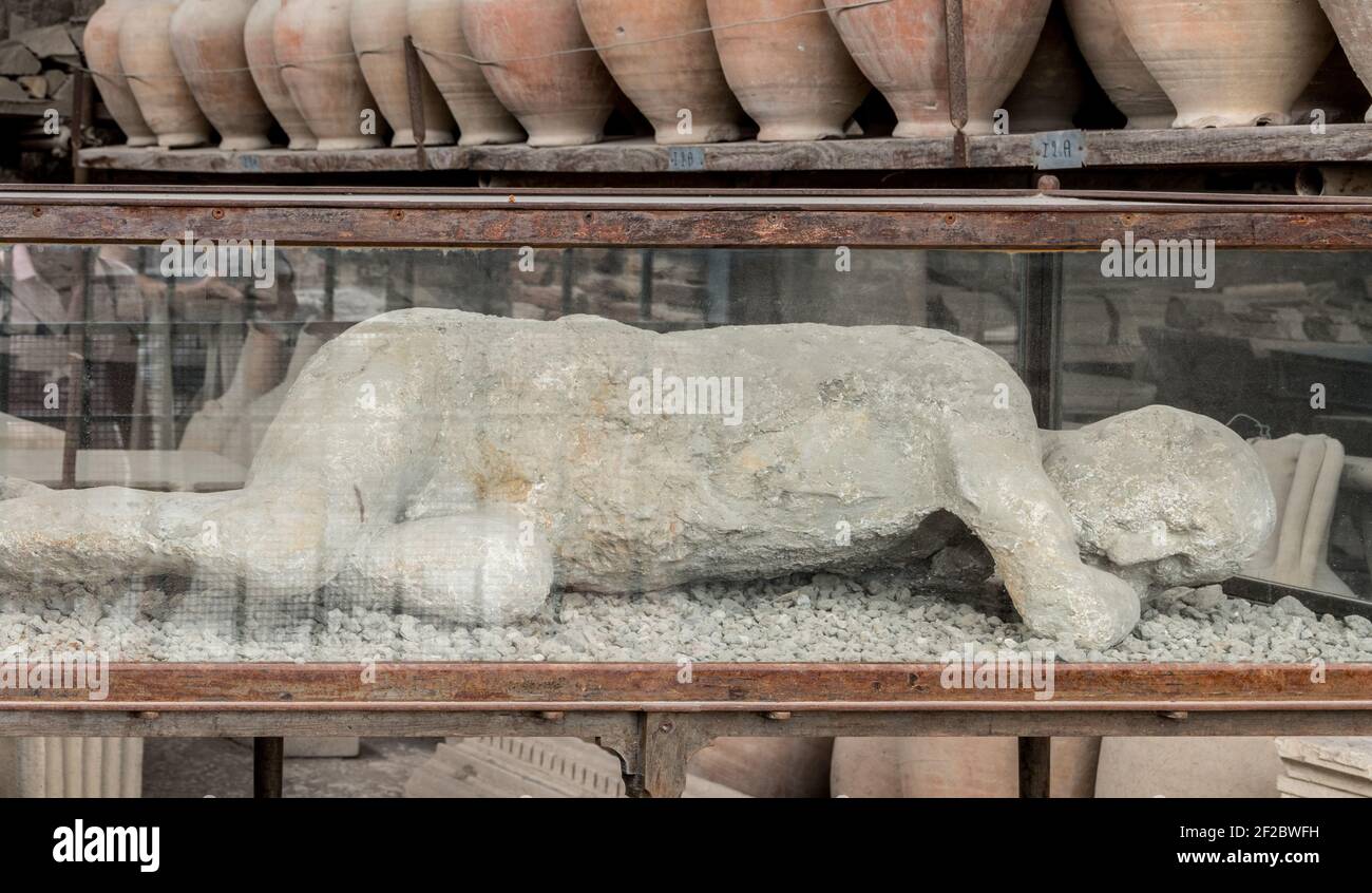 The cast of a man victim of the eruption of Mount Vesuvius in the ...