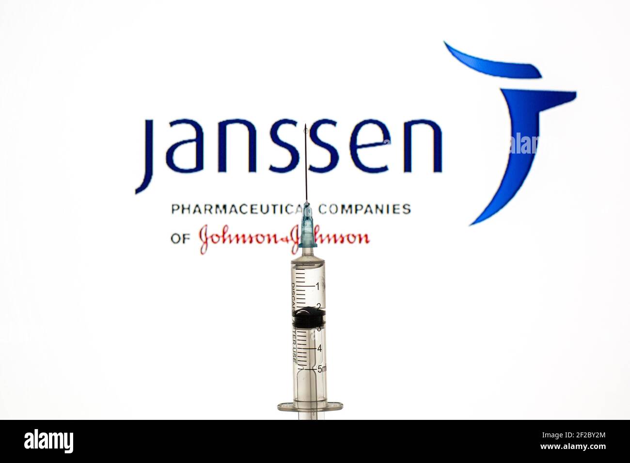 In this photo illustration, a medical syringe seen displayed in front ...