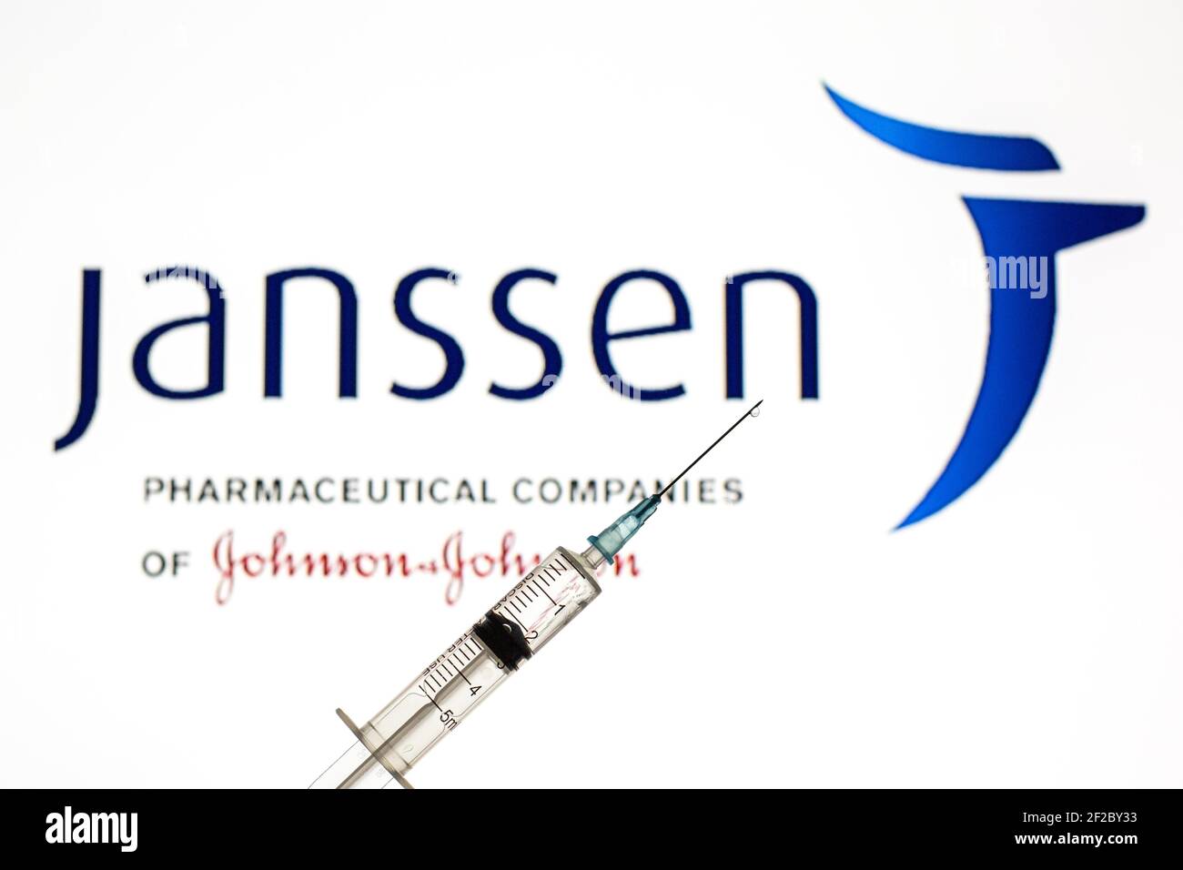 In this photo illustration, a medical syringe seen displayed in front ...