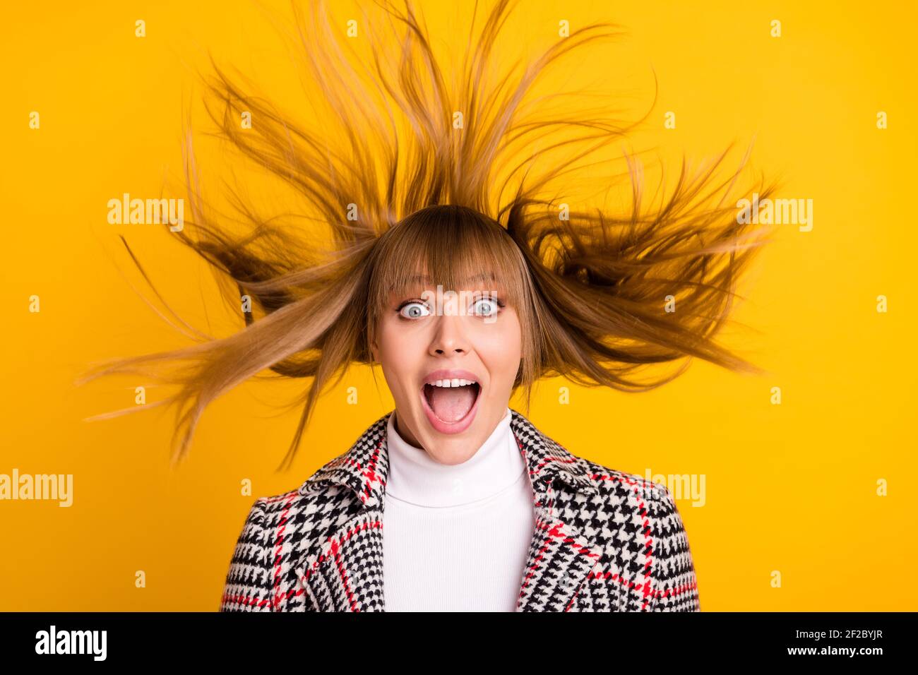 Portrait of positive lady flying hair open mouth unbelievable look ...