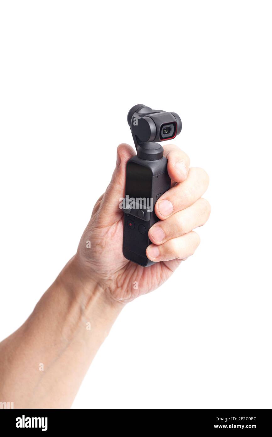 Hand hold action camera isolated on white background Stock Photo - Alamy