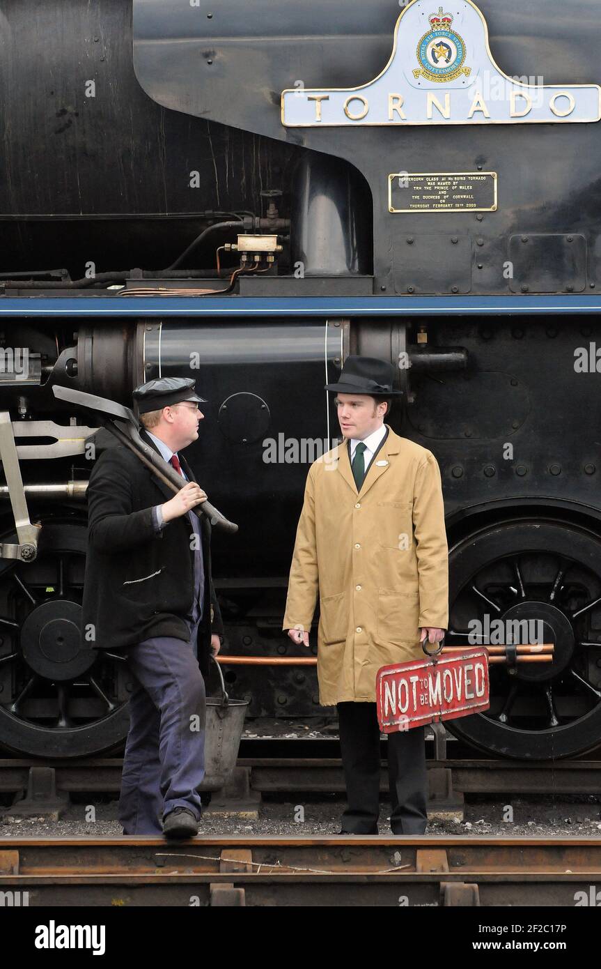 Fireman and foreman alongside "Tornado Stock Photo - Alamy