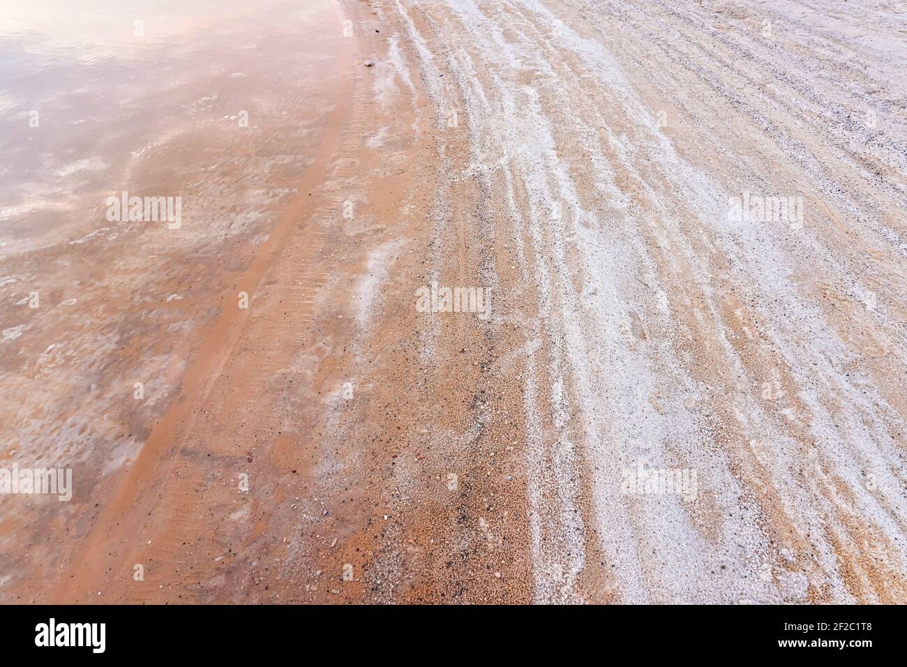 Salt on beach at Dead Sea - world most hypersaline lake Stock Photo - Alamy
