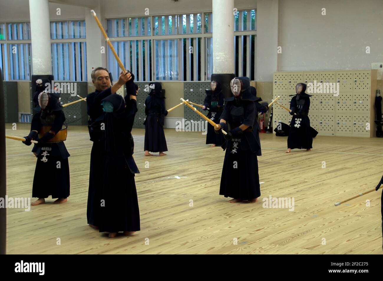 Group Of Young Kendoka Training At The Shudokan Building At Osaka Japan ...