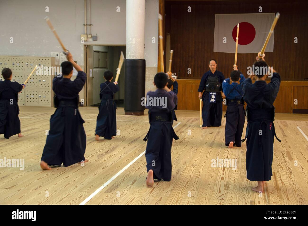 Group Of Young Kendoka Training At The Shudokan Building At Osaka Japan ...
