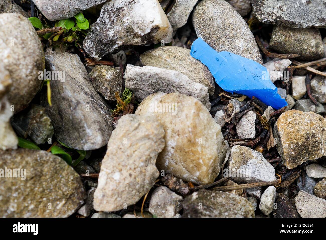 Small piece of blue plastic, France Stock Photo - Alamy