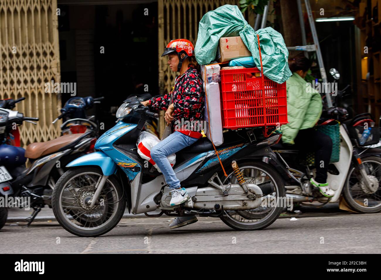 The traffic with Motorcycle in the streets of Hanoi in Vietnam Stock ...