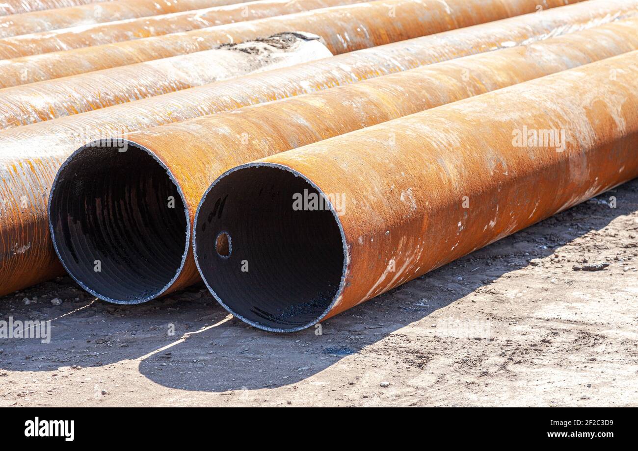 Rusty metal pipes at the construction site Stock Photo - Alamy
