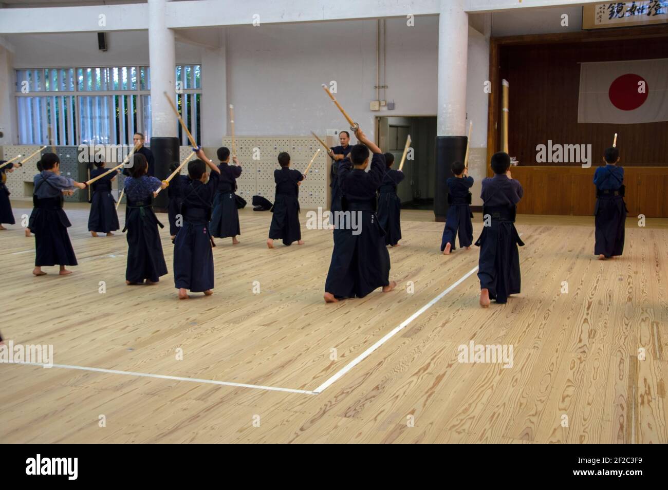 Group Of Young Kendoka Training At The Shudokan Building At Osaka Japan ...