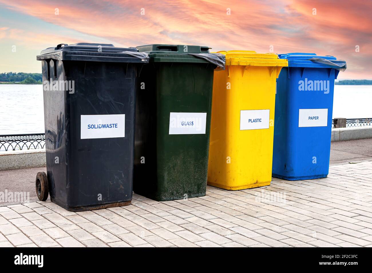 Separation bins according to waste type. Separate garbage containers on ...