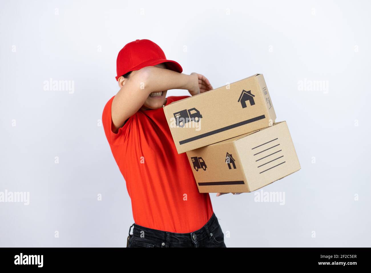 Young Beautiful Woman Wearing Courier Uniform Holding Delivery Packages