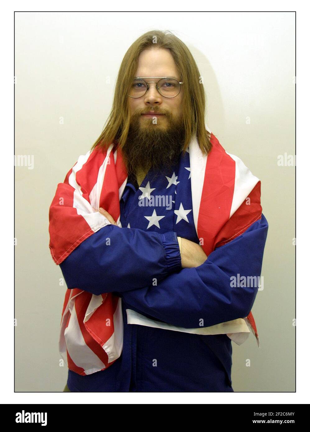 Jesse Schust marching against war on Saturday...pic David Sandison 13/2 ...