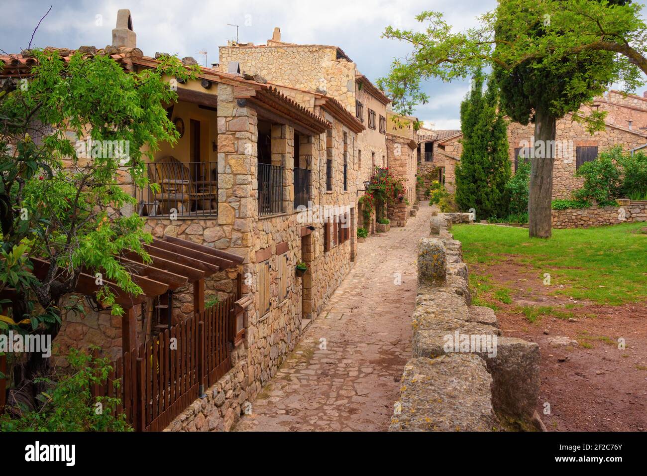 Street of the historical center of Siurana de Prades, in Catalonia ...