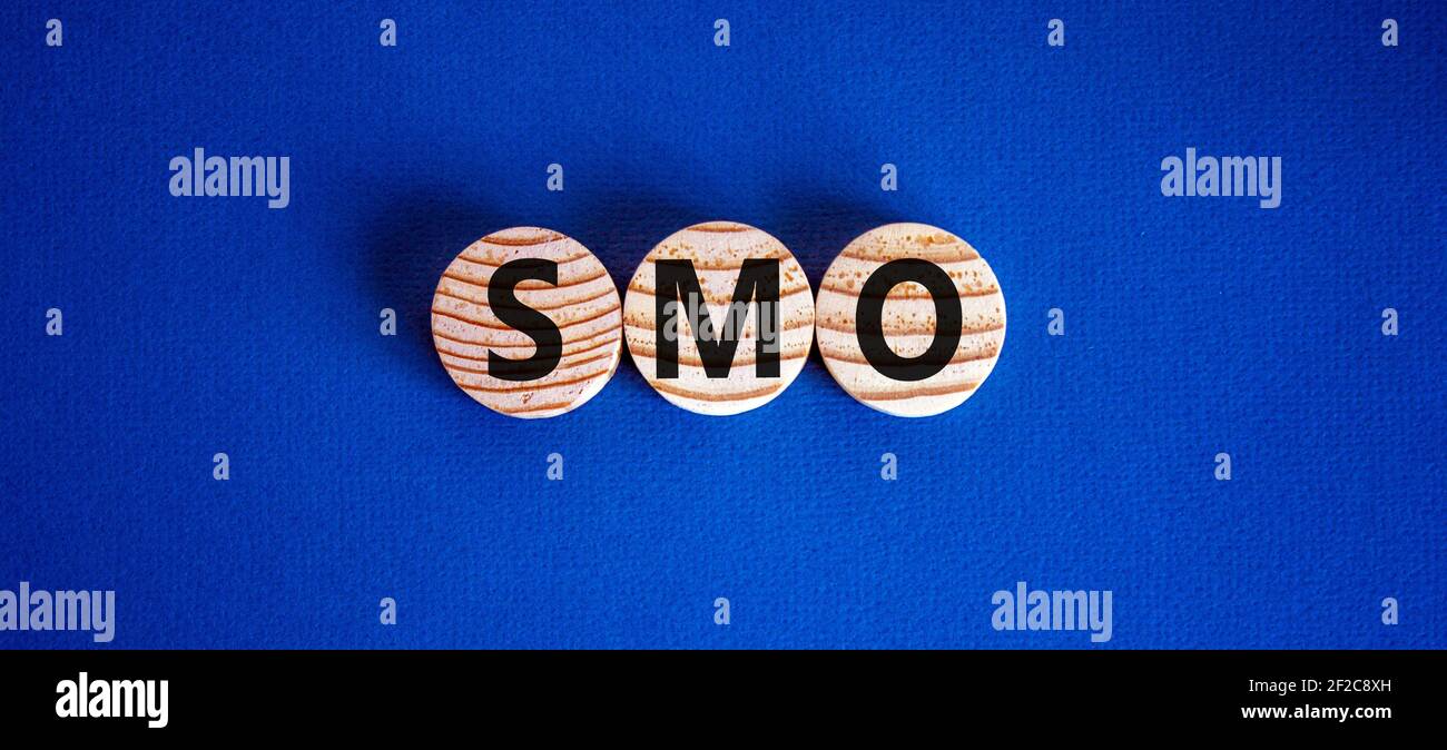 SMO, social media optimization symbol. Wooden circles with word 'SMO ...