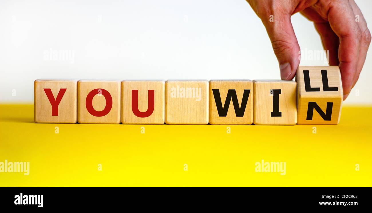 You will win symbol. Businessman turns cubes and changes words you will ...