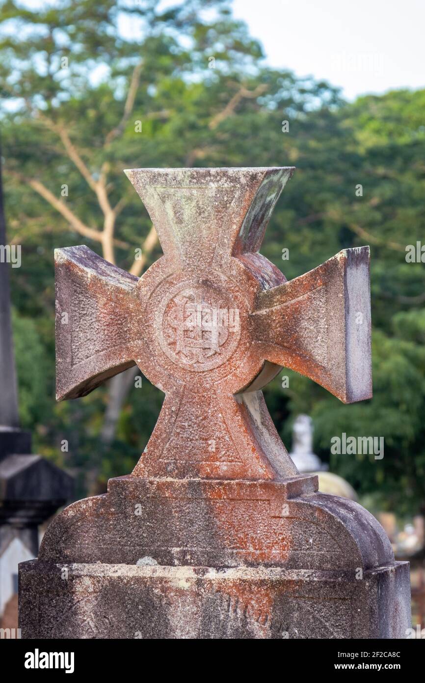 Stone cross on cemetery grave Stock Photo - Alamy