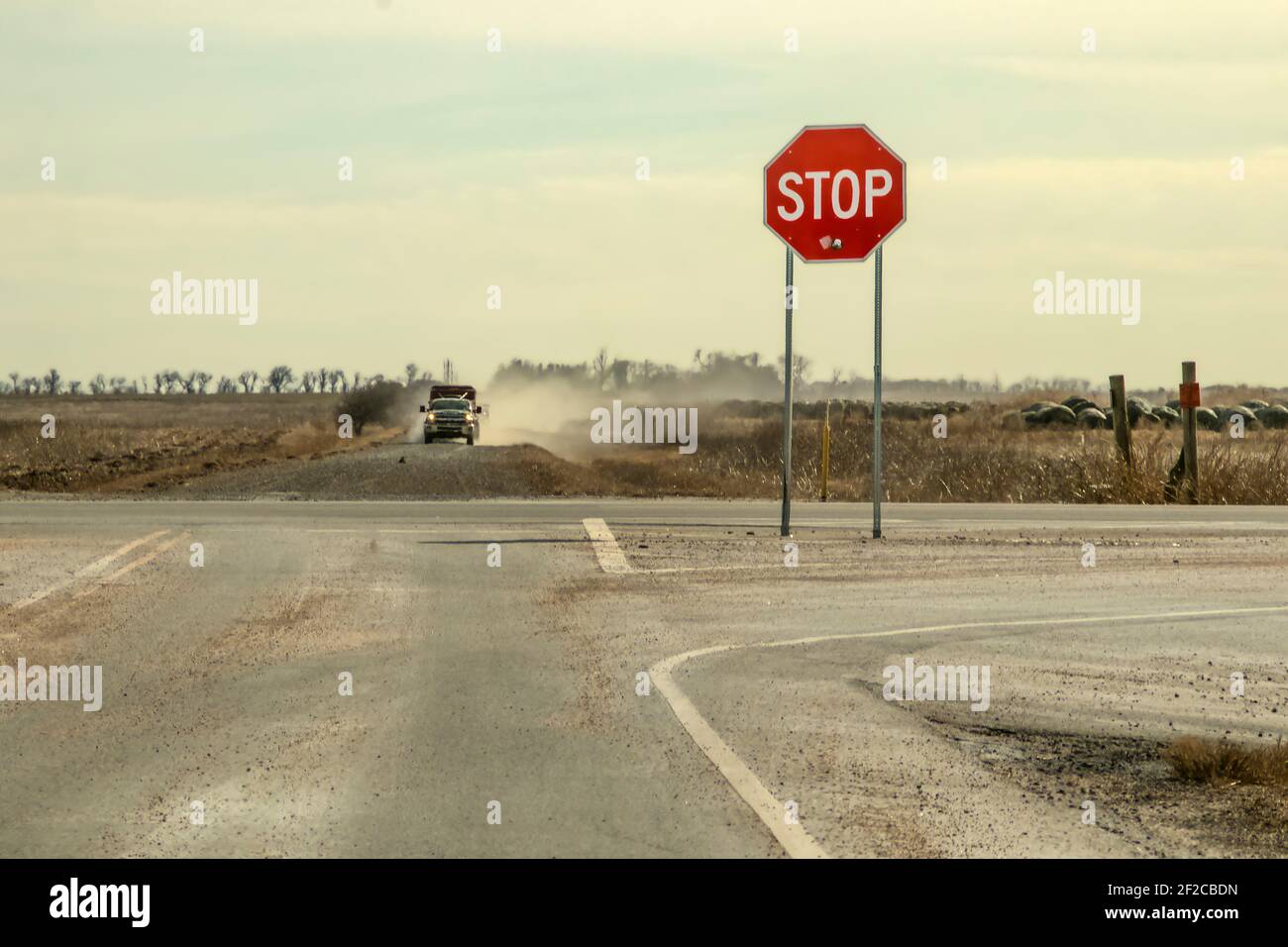 Stop sign country road intersection hi-res stock photography and images ...