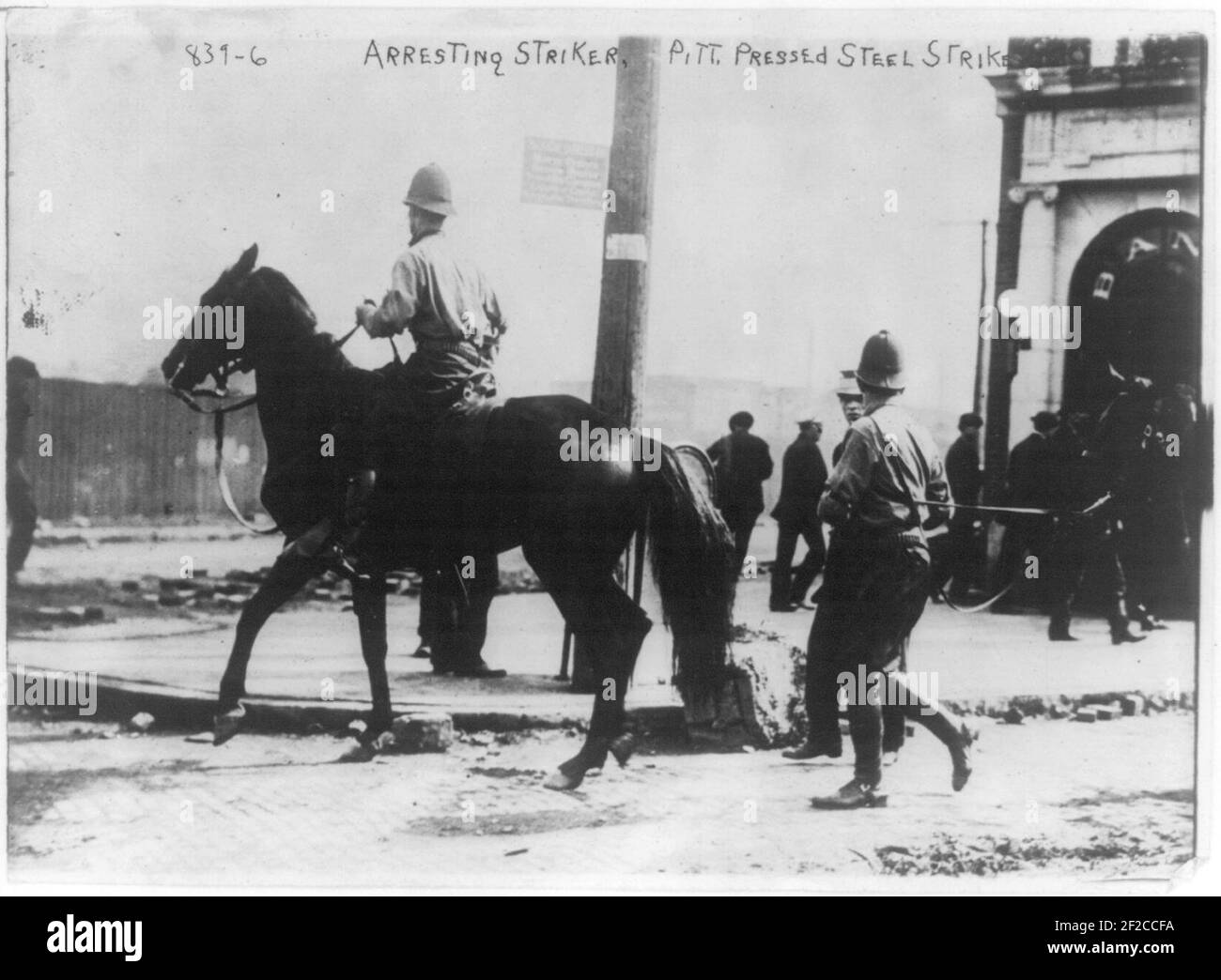 Police arresting striker, Pitt. Pressed Steel strike, Sept. 22, 1919 ...