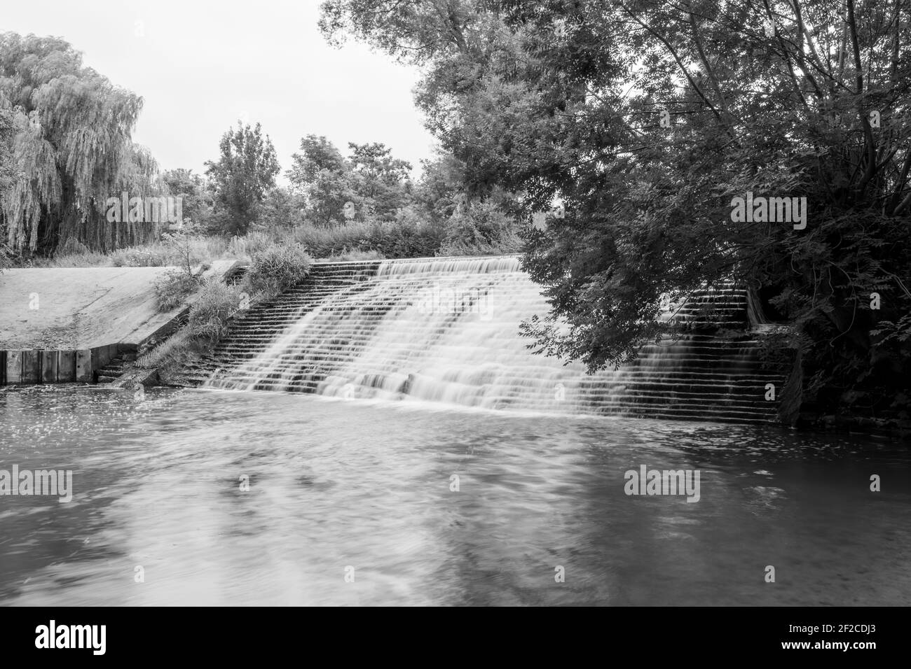 Long exposure of the River Brue flowing through the weir at West ...