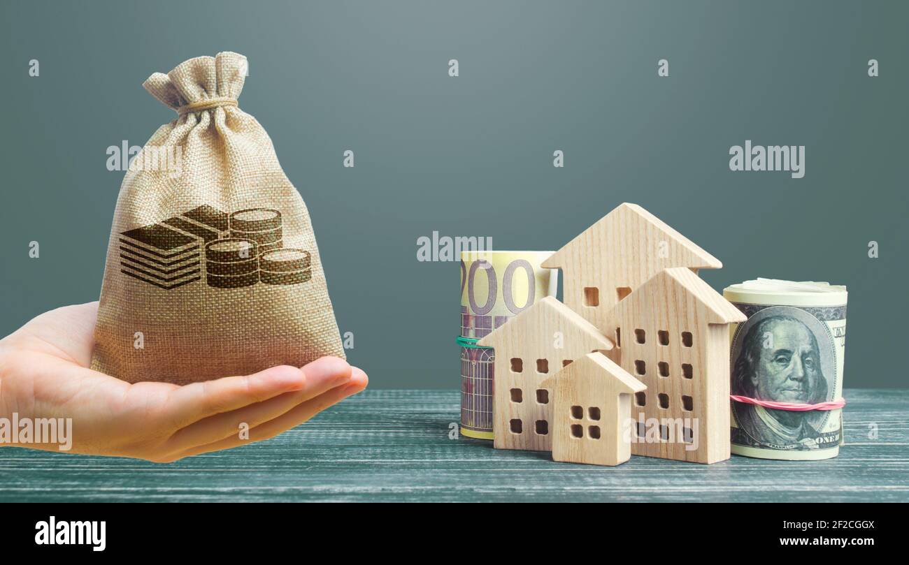Money bag, residential buildings and dollar euro money. House ...