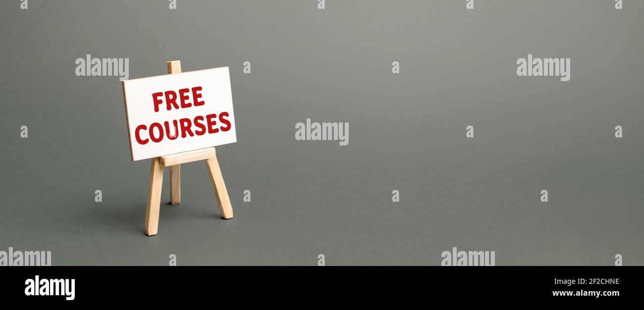 Stand with the words Free courses. Free education concept. Online ...