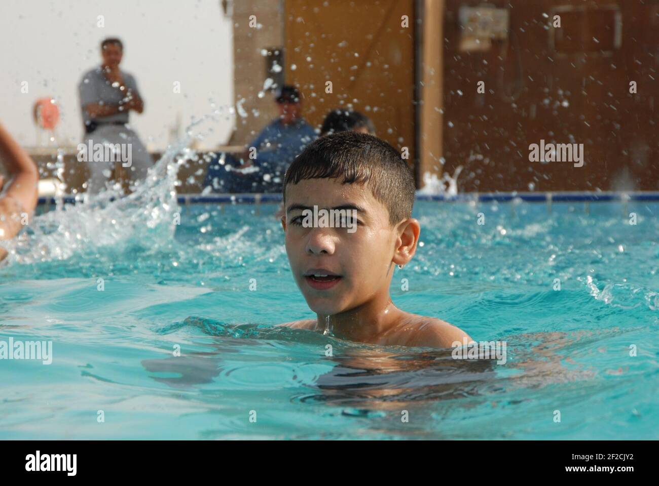 Pool Party for Iraqi Boy and Girl Scouts Stock Photo - Alamy