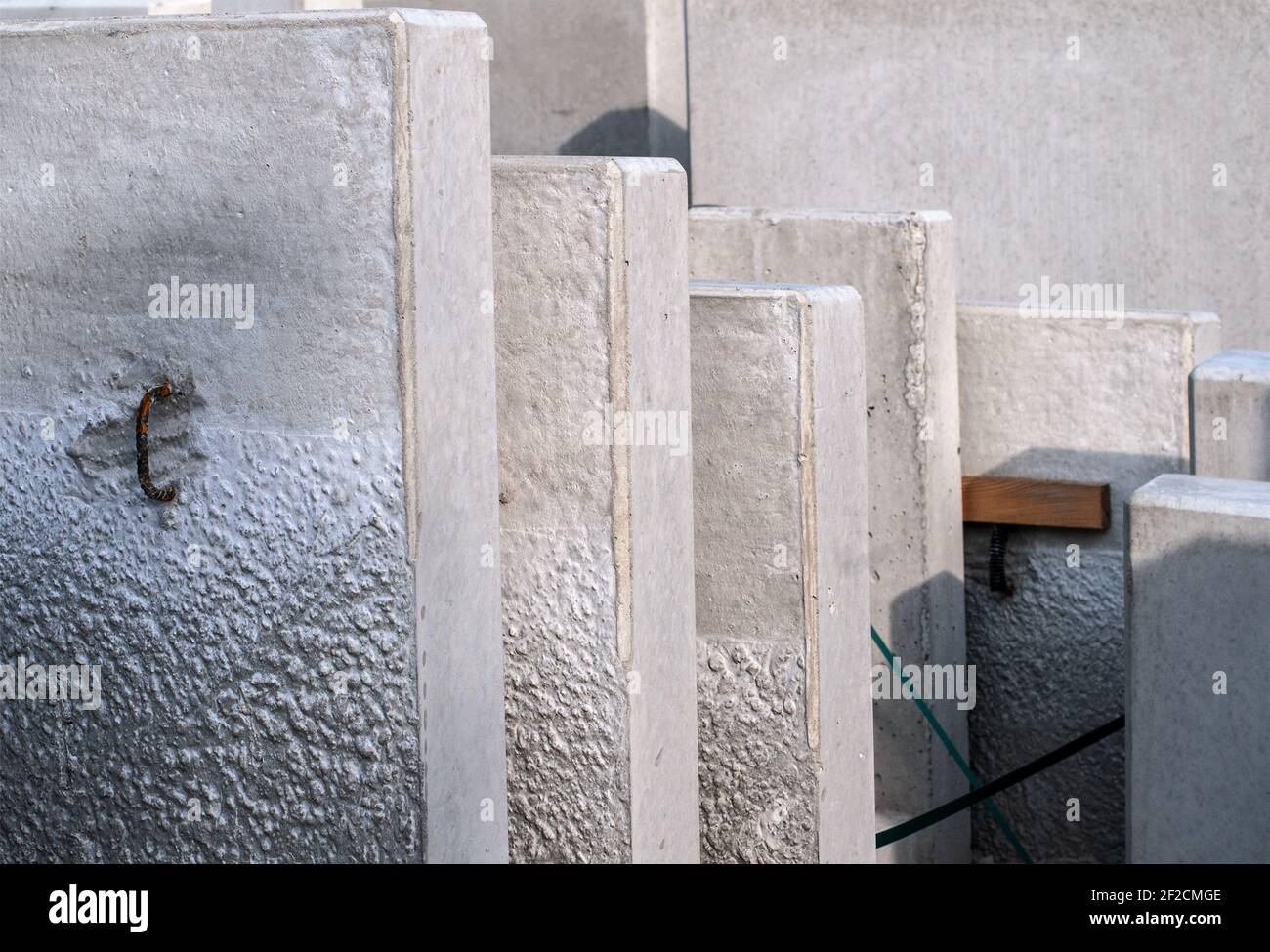 precast concrete blocks in a row at a construction site Stock Photo - Alamy