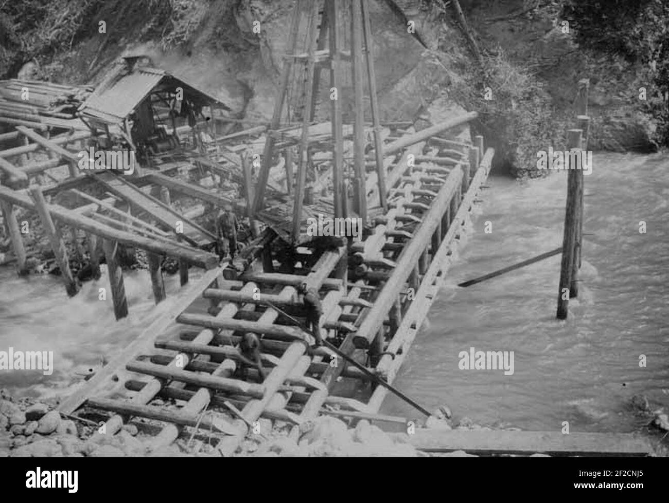 Porcupine Gold Mining Company flume under construction with workmen ...