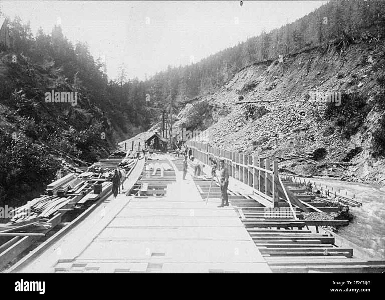 Porcupine Gold Mining Company flume under construction with workmen ...