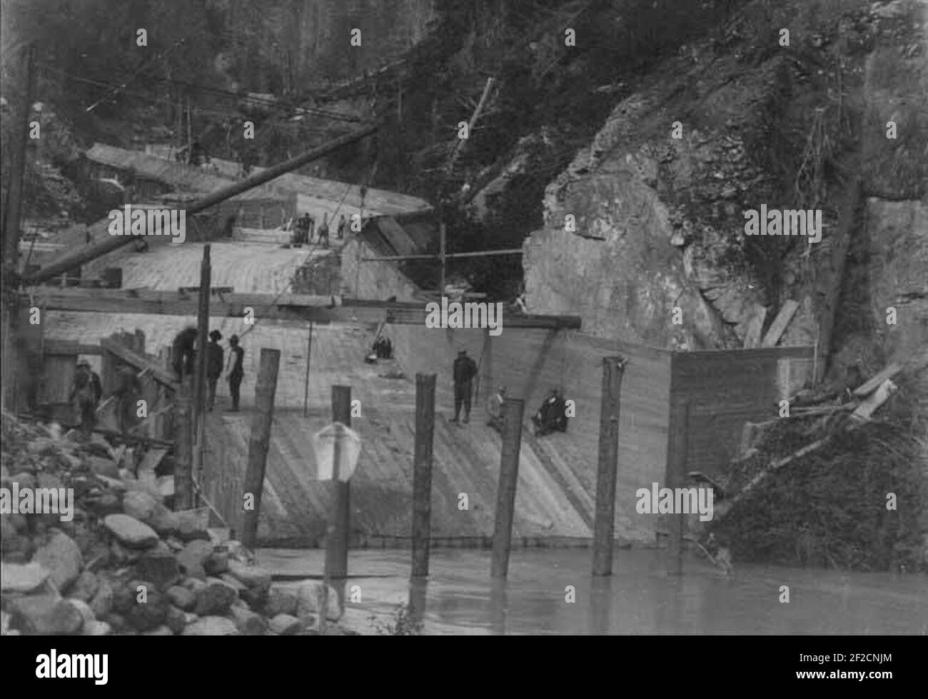 Porcupine Gold Mining Company flume showing men working on the ...
