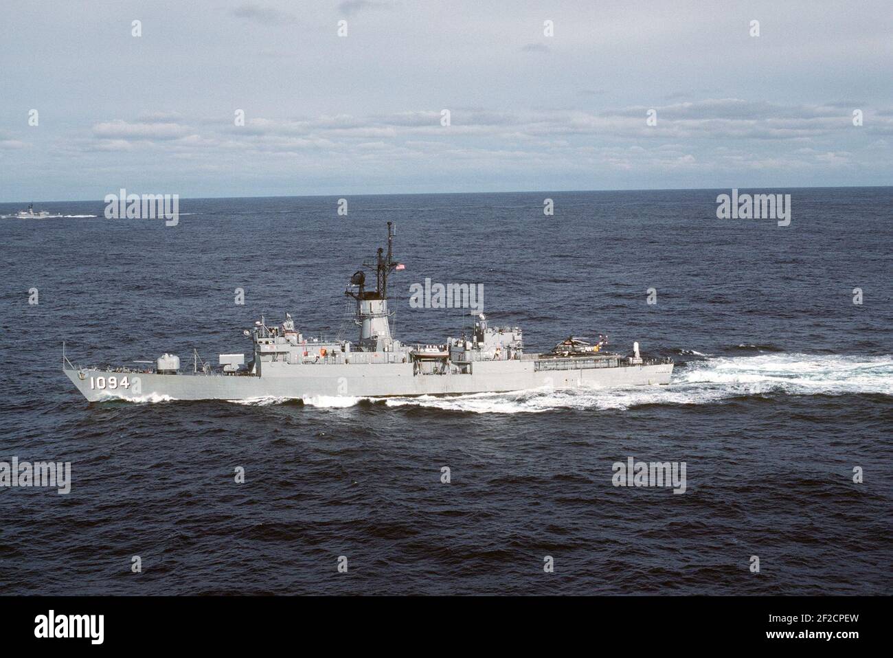 Port beam view of USS Pharris (FF-1094) underway during BALTOPS 1985 DN ...