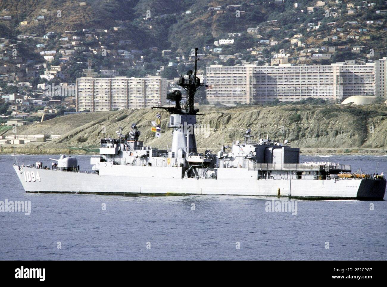 Port beam view of USS Pharris (FF-1094) off South American coast during ...