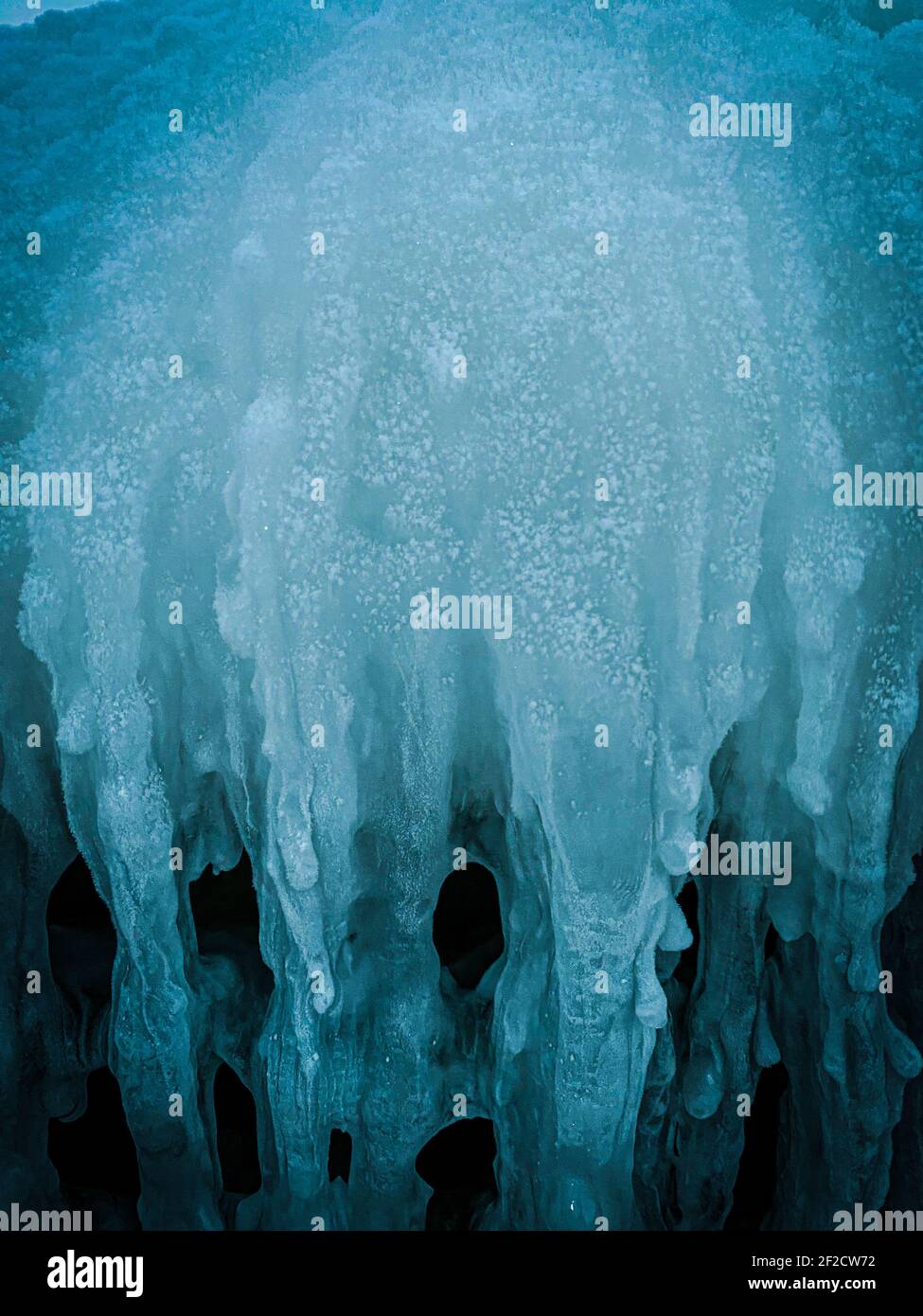 An abstract photo of the ice formed in the shape of flowing water Stock ...