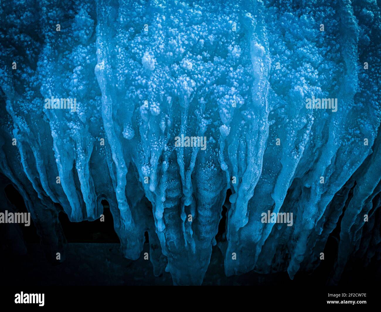 An abstract photo of the ice formed in the shape of flowing water Stock ...