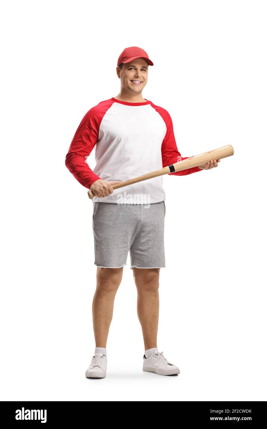 Full length portrait of a young man with a baseball bat smiling at ...