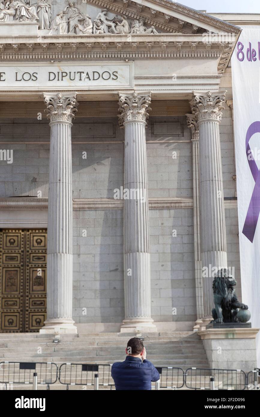Spanish Congress of Deputies Building. Tourist taking photos. Madrid ...