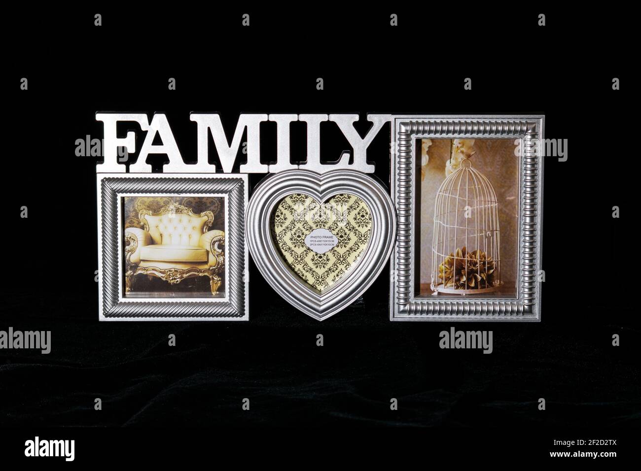 Silver Family photo portrait in black background Stock Photo - Alamy