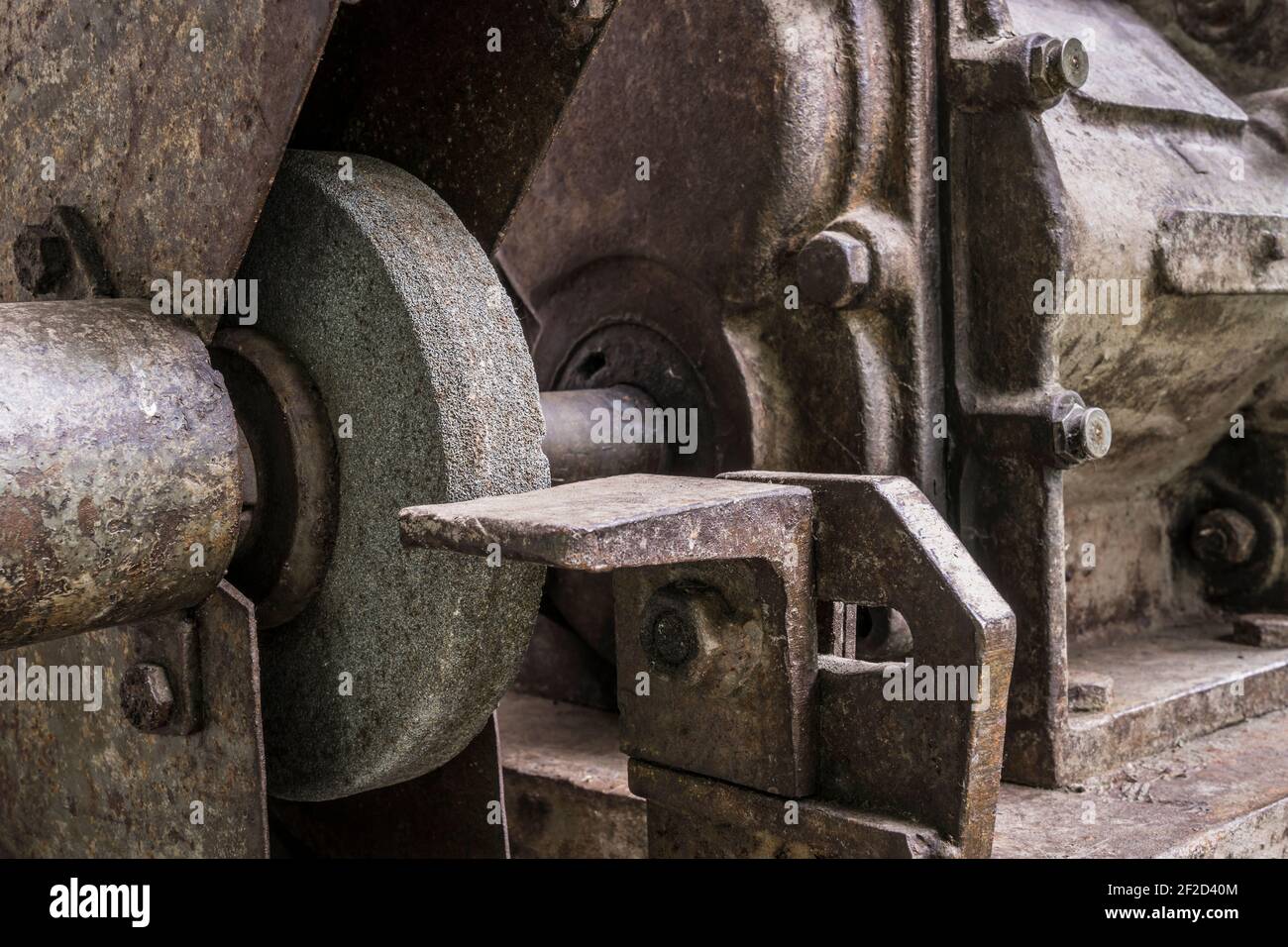 historic grinding machine in a workshop Stock Photo - Alamy