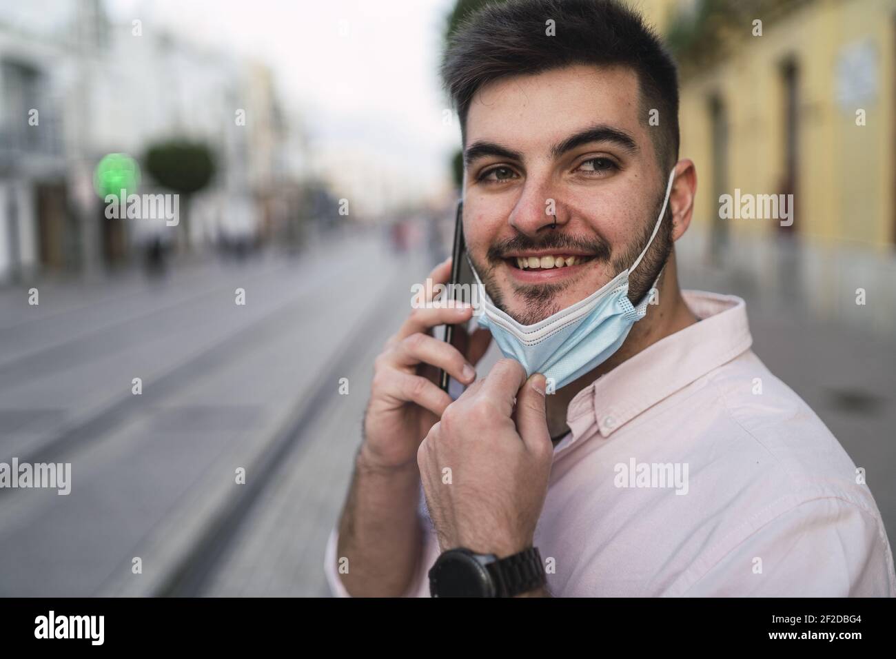 Happy smiling handsome man speaking hi-res stock photography and images ...