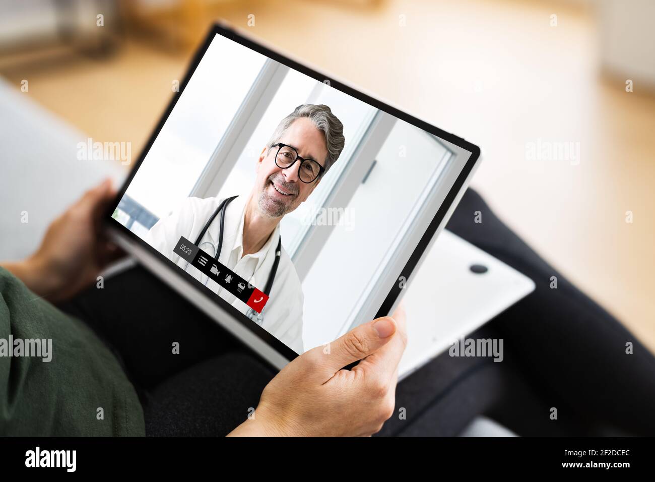 Doctor appointment on video call hi-res stock photography and images ...