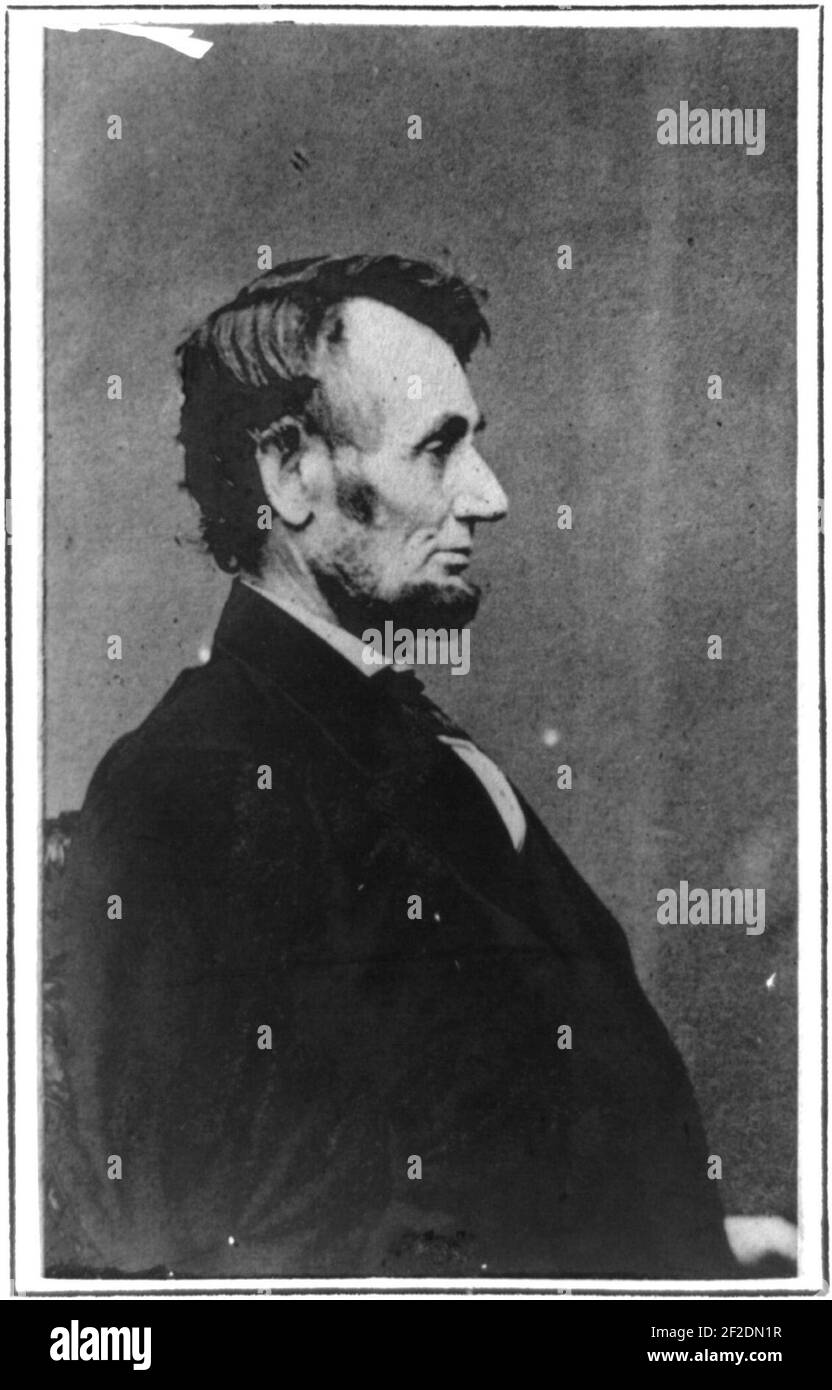 Portrait profile of President Abraham Lincoln, facing right and seated ...