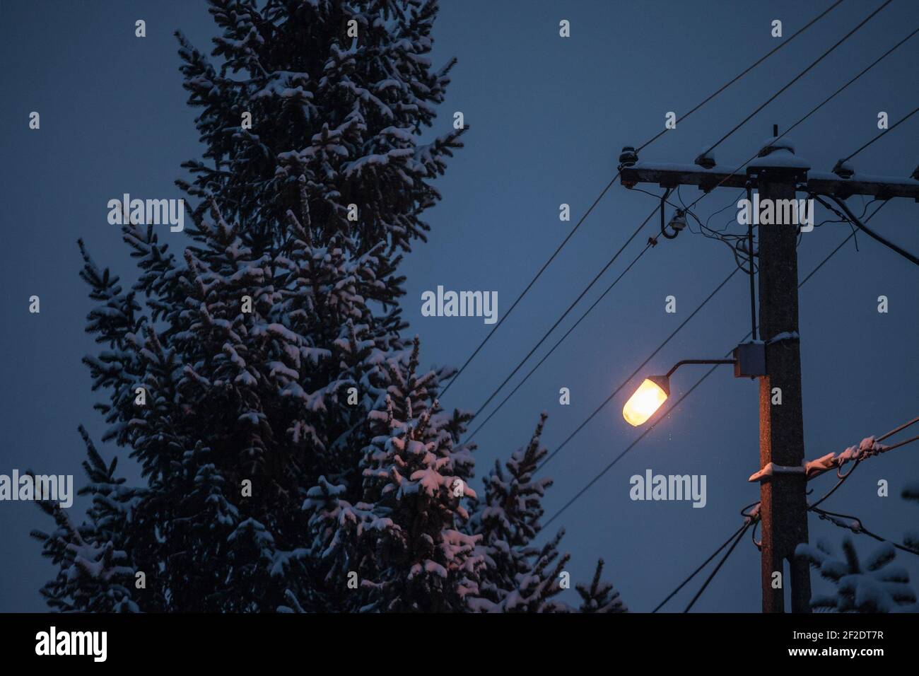Old power electric line and a Street Lamp light, power supply cable ...
