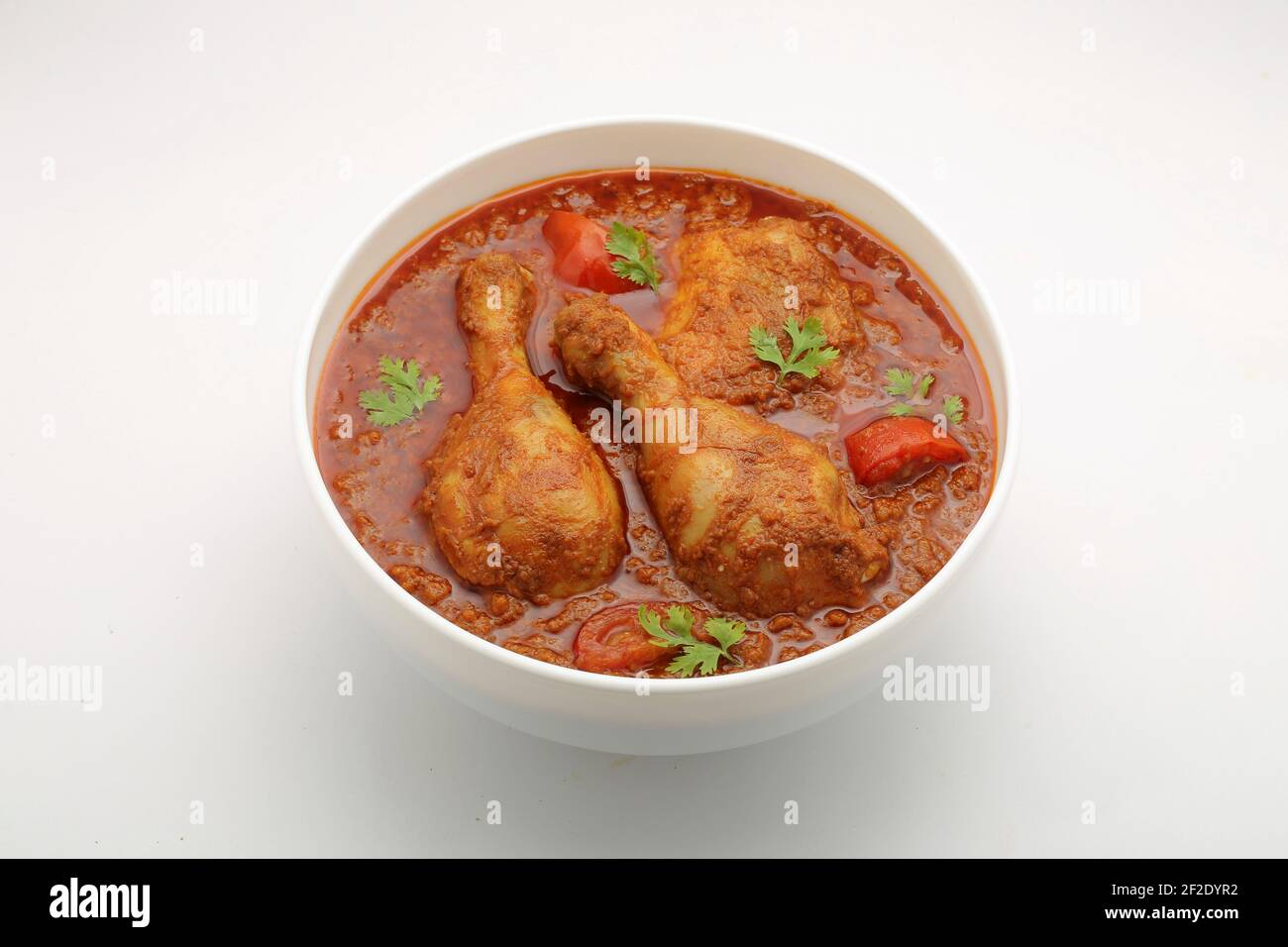 Spicy reddish chicken curry hi-res stock photography and images - Alamy